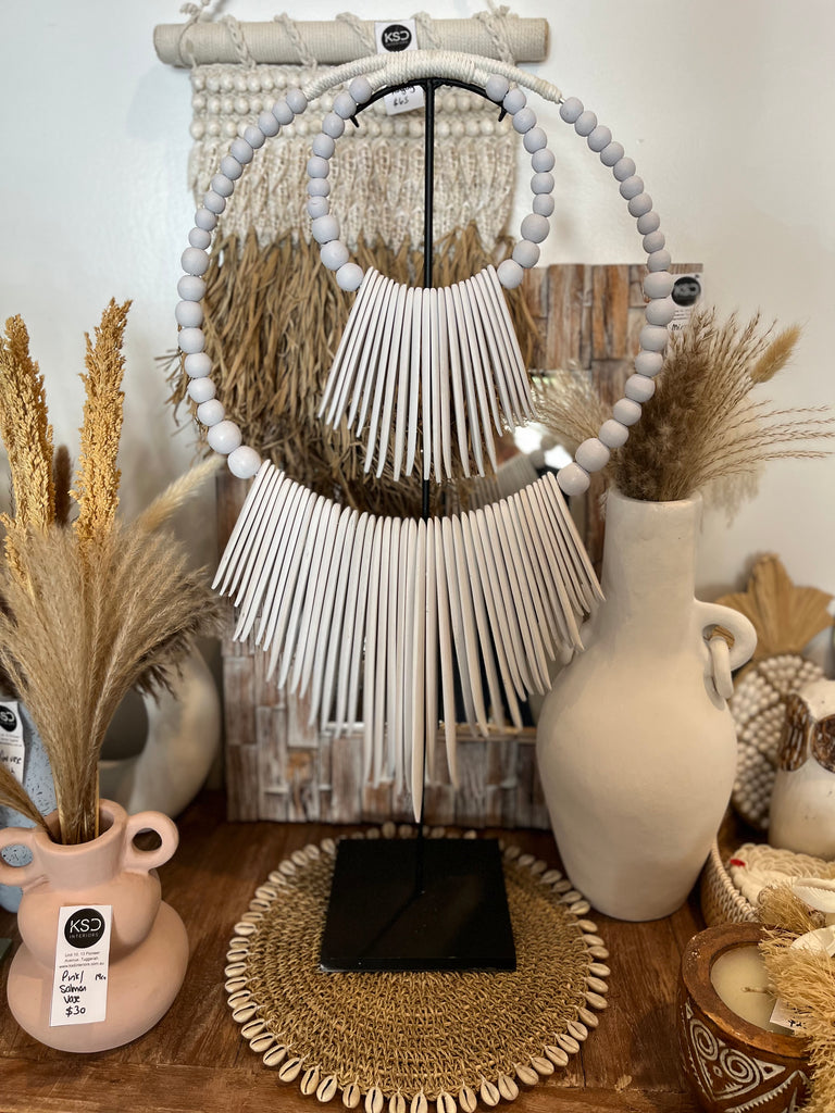 White timber decoration on stand – Bali Beach Beyond